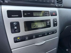 Sarkans Toyota Corolla 2006 Viļņa, ar dzinēja tilpumu 1.60 L un nobraukumu 348 tūkst. km par 3900 €, foto 12 vietnē AUTOMOTO.COM.LV
