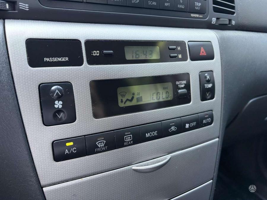 Sarkans Toyota Corolla 2006 Viļņa, ar dzinēja tilpumu 1.60 L un nobraukumu 348 tūkst. km par 3900 €, foto 12 vietnē AUTOMOTO.COM.LV