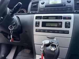 Sarkans Toyota Corolla 2006 Viļņa, ar dzinēja tilpumu 1.60 L un nobraukumu 348 tūkst. km par 3900 €, foto 16 vietnē AUTOMOTO.COM.LV