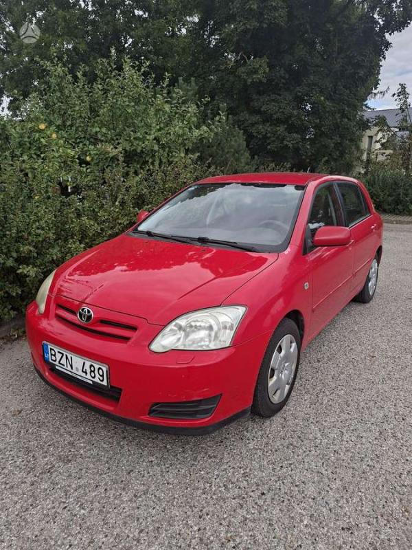 Red Toyota Corolla 2006 in Anyksciai, with an engine capacity of 1.40 L and mileage of 98 thousand km for 1450 €, photo 1 on AUTOMOTO.COM.LV