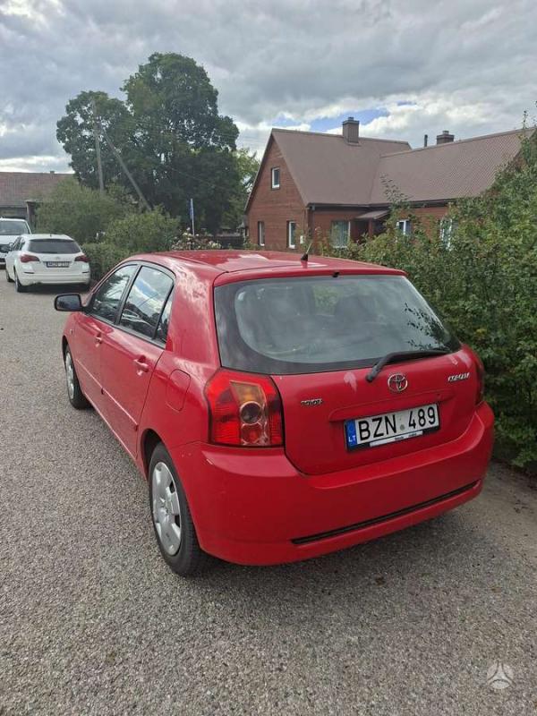 Red Toyota Corolla 2006 in Anyksciai, with an engine capacity of 1.40 L and mileage of 98 thousand km for 1450 €, photo 3 on AUTOMOTO.COM.LV