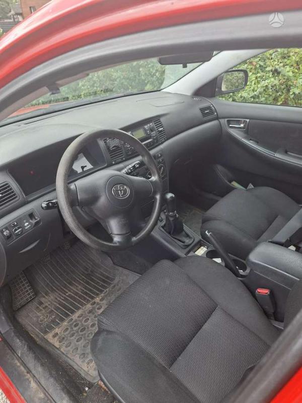 Red Toyota Corolla 2006 in Anyksciai, with an engine capacity of 1.40 L and mileage of 98 thousand km for 1450 €, photo 5 on AUTOMOTO.COM.LV