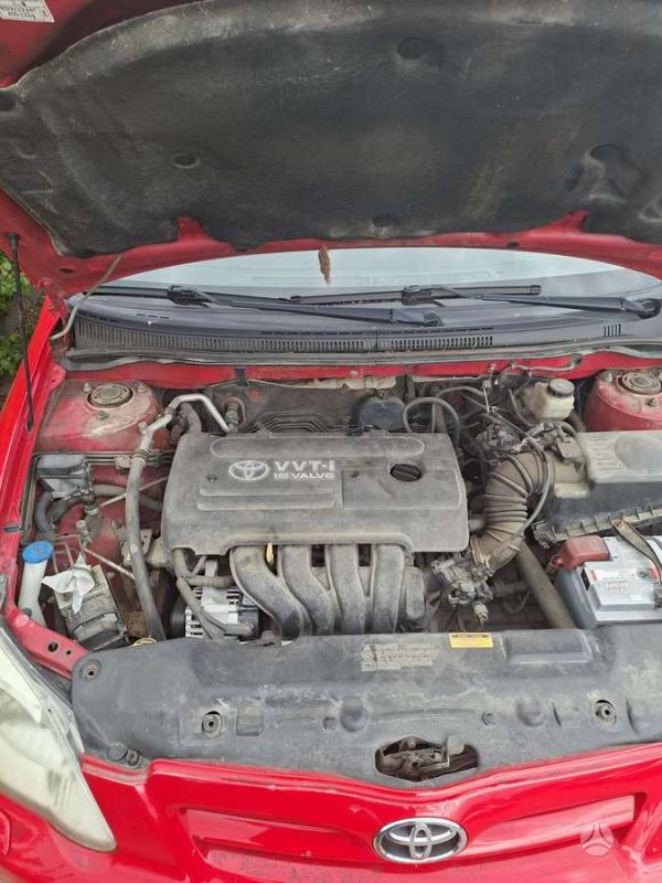 Red Toyota Corolla 2006 in Anyksciai, with an engine capacity of 1.40 L and mileage of 98 thousand km for 1450 €, photo 7 on AUTOMOTO.COM.LV