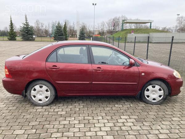 Red Toyota Corolla 2005 in Jelgava, with an engine capacity of 1.60 L and mileage of 151 thousand km for 2000 €, photo 3 on AUTOMOTO.COM.LV