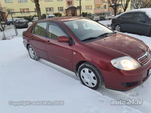 Sarkans Toyota Corolla 2006 Tallina, ar dzinēja tilpumu 1.40 L un nobraukumu 160 tūkst. km par 2700 €, foto 11 vietnē AUTOMOTO.COM.LV