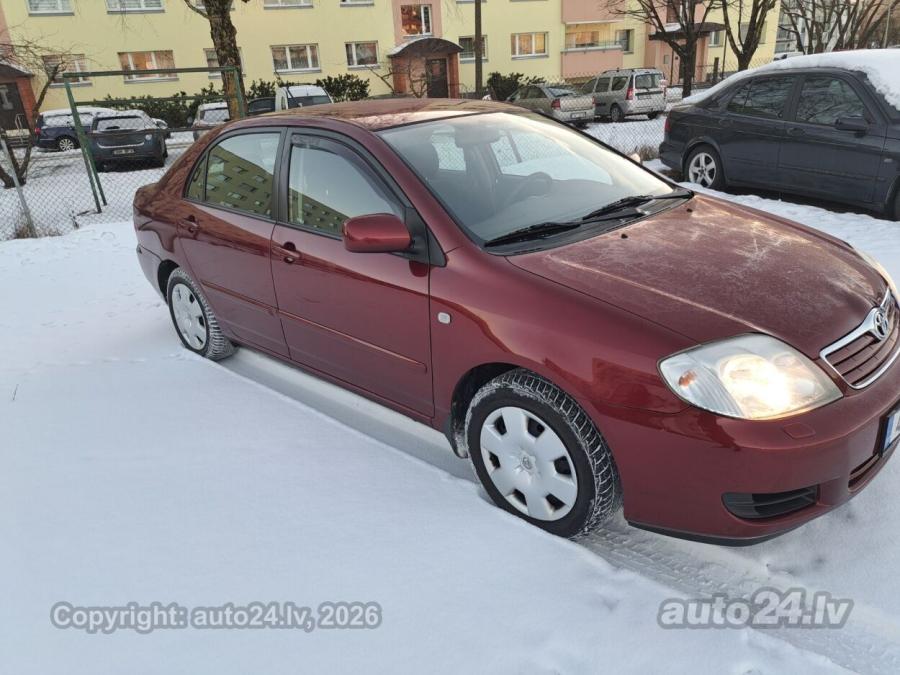 Sarkans Toyota Corolla 2006 Tallina, ar dzinēja tilpumu 1.40 L un nobraukumu 160 tūkst. km par 2700 €, foto 11 vietnē AUTOMOTO.COM.LV