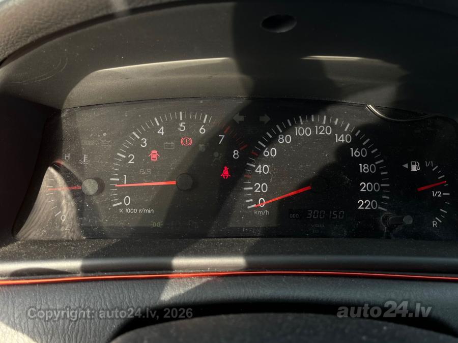 Sarkans Toyota Corolla 2006 Hāpsalu, ar dzinēja tilpumu 1.60 L un nobraukumu 301 tūkst. km par 2500 €, foto 7 vietnē AUTOMOTO.COM.LV