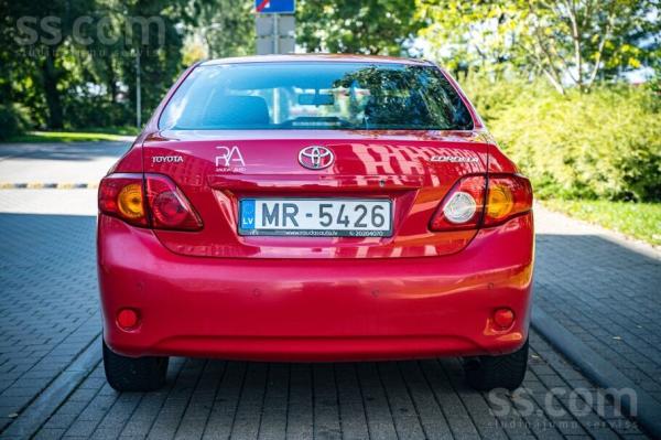 Toyota Corolla 2007 in Riga on AUTOMOTO.COM.LV Red Toyota Corolla 2007 in Riga, with an engine capacity of 1.60 L and mileage of 289 thousand km for 2990 €, photo 6 on AUTOMOTO.COM.LV