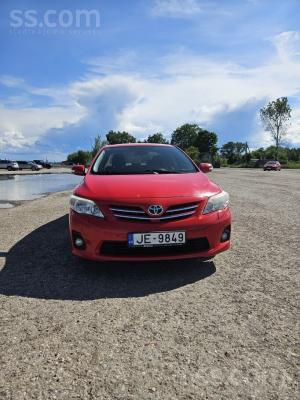 Sarkans Toyota Corolla 2013 Rīga, ar dzinēja tilpumu 1.60 L un nobraukumu 206 tūkst. km par 4500 €, foto 10 vietnē AUTOMOTO.COM.LV