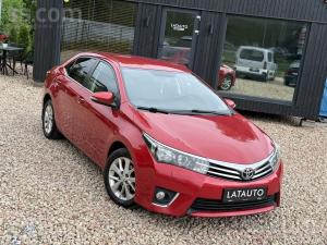 Red Toyota Corolla 2015 in Riga, with an engine capacity of 1.40 L and mileage of 199 thousand km for 6450 €, photo  on AUTOMOTO.COM.LV