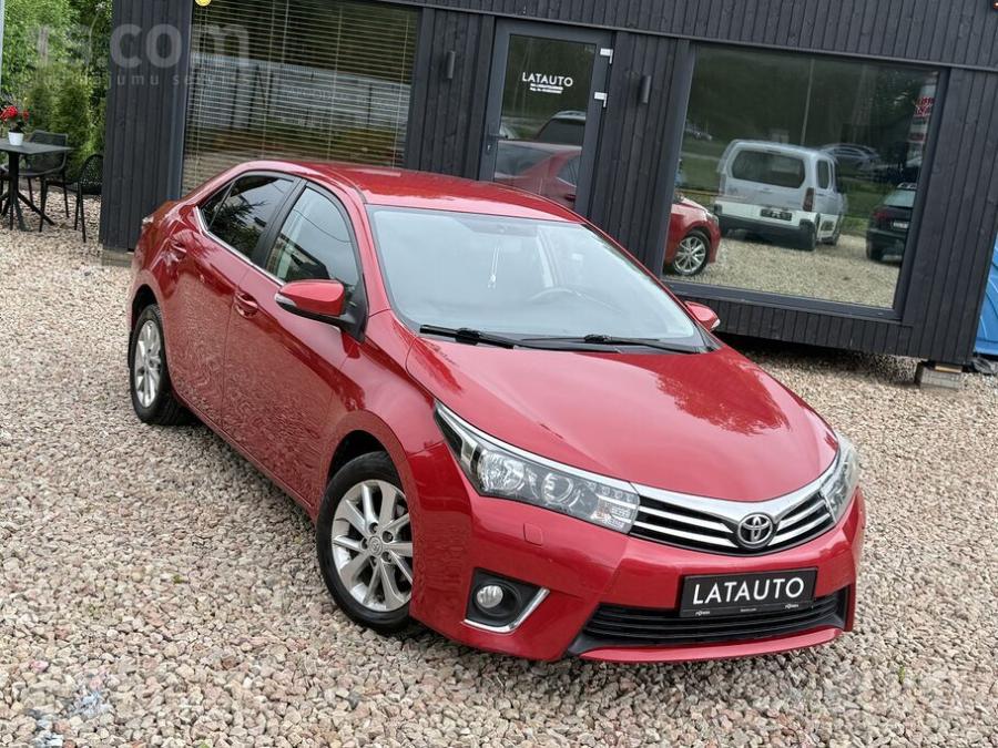 Red Toyota Corolla 2015 in Riga, with an engine capacity of 1.40 L and mileage of 199 thousand km for 6450 €, photo 1 on AUTOMOTO.COM.LV