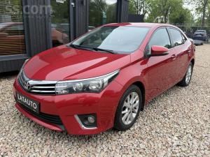 Red Toyota Corolla 2015 in Riga, with an engine capacity of 1.40 L and mileage of 199 thousand km for 6450 €, photo 6 on AUTOMOTO.COM.LV