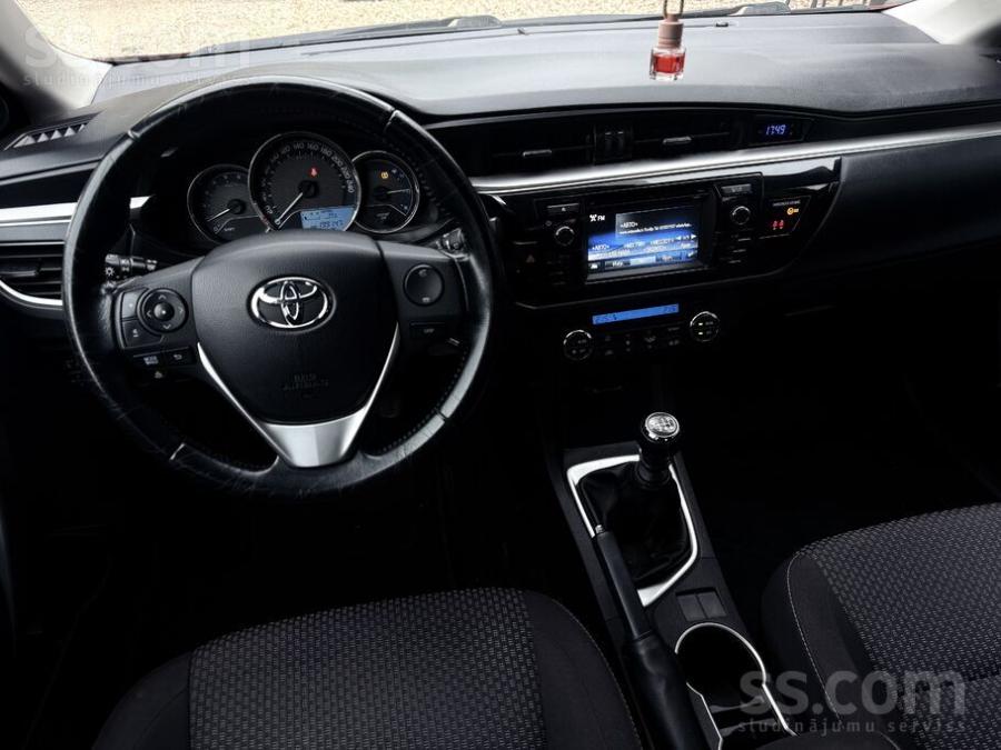 Red Toyota Corolla 2015 in Riga, with an engine capacity of 1.40 L and mileage of 199 thousand km for 6450 €, photo 19 on AUTOMOTO.COM.LV