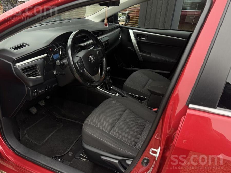 Red Toyota Corolla 2015 in Riga, with an engine capacity of 1.40 L and mileage of 199 thousand km for 6450 €, photo 20 on AUTOMOTO.COM.LV