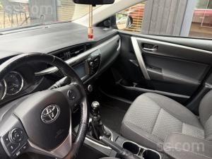 Red Toyota Corolla 2015 in Riga, with an engine capacity of 1.40 L and mileage of 199 thousand km for 6450 €, photo 21 on AUTOMOTO.COM.LV