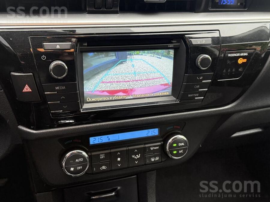 Red Toyota Corolla 2015 in Riga, with an engine capacity of 1.40 L and mileage of 199 thousand km for 6450 €, photo 28 on AUTOMOTO.COM.LV