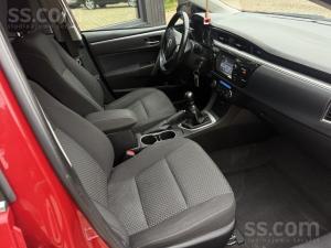 Red Toyota Corolla 2015 in Riga, with an engine capacity of 1.40 L and mileage of 199 thousand km for 6450 €, photo 29 on AUTOMOTO.COM.LV