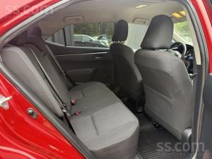 Red Toyota Corolla 2015 in Riga, with an engine capacity of 1.40 L and mileage of 199 thousand km for 6450 €, photo 31 on AUTOMOTO.COM.LV
