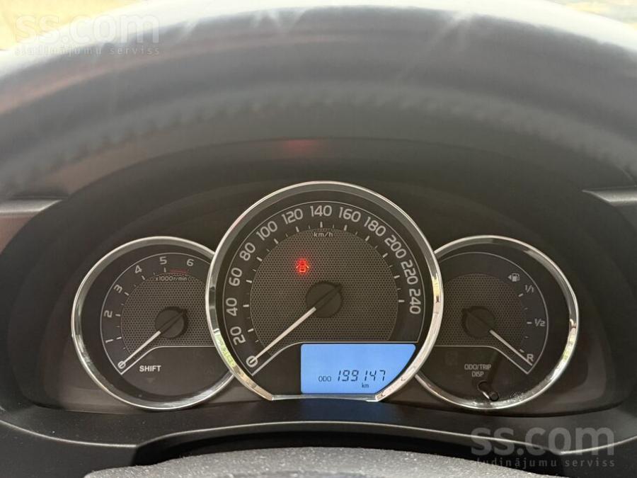 Red Toyota Corolla 2015 in Riga, with an engine capacity of 1.40 L and mileage of 199 thousand km for 6450 €, photo 32 on AUTOMOTO.COM.LV