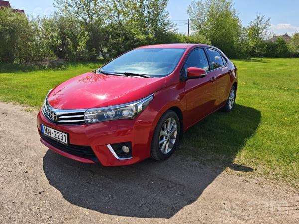 Sarkans Toyota Corolla 2015 Bauska, ar dzinēja tilpumu 1.40 L un nobraukumu 199 tūkst. km par 5800 €, foto 2 vietnē AUTOMOTO.COM.LV