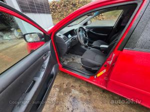 Sarkans Toyota Corolla 2005 Tallina, ar dzinēja tilpumu 1.40 L un nobraukumu 417 tūkst. km par 1100 €, foto 7 vietnē AUTOMOTO.COM.LV