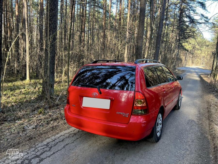 Red Toyota Corolla 2005 in Vilnius, with an engine capacity of 1.40 L and mileage of 388 thousand km for 1450 €, photo 6 on AUTOMOTO.COM.LV