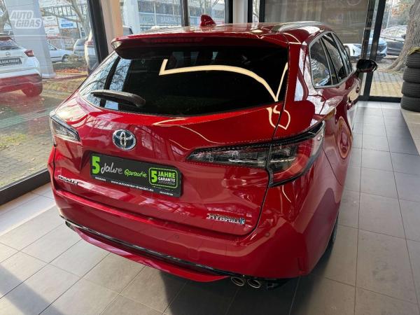 Red Toyota Corolla 2021 in Kaunas, with an engine capacity of 2.00 L and mileage of 52 thousand km for 24439 €, photo 6 on AUTOMOTO.COM.LV