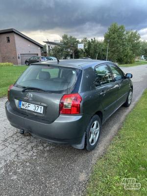 Toyota Corolla 2003 in Vilnius, with an engine capacity of 2.00 L and mileage of 256 thousand km for 1050 €, photo 4 on AUTOMOTO.COM.LV