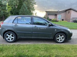 Toyota Corolla 2003 in Vilnius, with an engine capacity of 2.00 L and mileage of 256 thousand km for 1050 €, photo 6 on AUTOMOTO.COM.LV