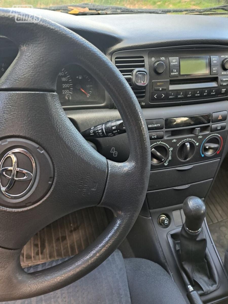 Toyota Corolla 2003 in Radviliskis, with an engine capacity of 1.40 L and mileage of 226 thousand km for 1100 €, photo 8 on AUTOMOTO.COM.LV