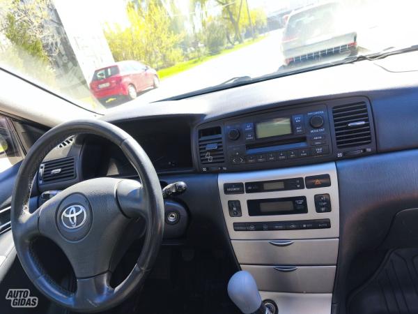 Toyota Corolla 2004 Kauņa, ar dzinēja tilpumu 2.00 L un nobraukumu 300 tūkst. km par 1100 €, foto 7 vietnē AUTOMOTO.COM.LV