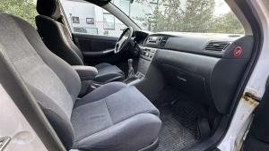 White Toyota Corolla 2002 in Vilnius, with an engine capacity of 2.00 L and mileage of 300 thousand km for 1050 €, photo 9 on AUTOMOTO.COM.LV