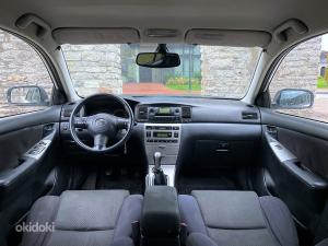 Balts Toyota Corolla 2005 Tallina, ar dzinēja tilpumu 1.40 L un nobraukumu 345 tūkst. km par 699 €, foto 12 vietnē AUTOMOTO.COM.LV