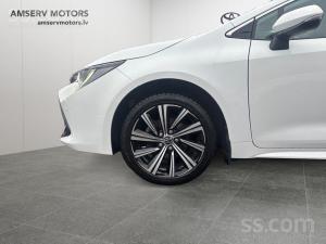 White Toyota Corolla 2022 in Riga, with an engine capacity of 1.80 L and mileage of 52 thousand km for 18900 €, photo 15 on AUTOMOTO.COM.LV