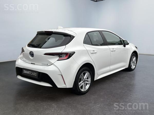 White Toyota Corolla 2022 in Riga, with an engine capacity of 1.80 L and mileage of 68 thousand km for 16940 €, photo 5 on AUTOMOTO.COM.LV