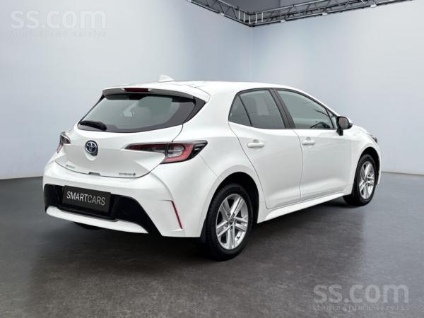 White Toyota Corolla 2022 in Riga, with an engine capacity of 1.80 L and mileage of 103 thousand km for 15920 €, photo 5 on AUTOMOTO.COM.LV