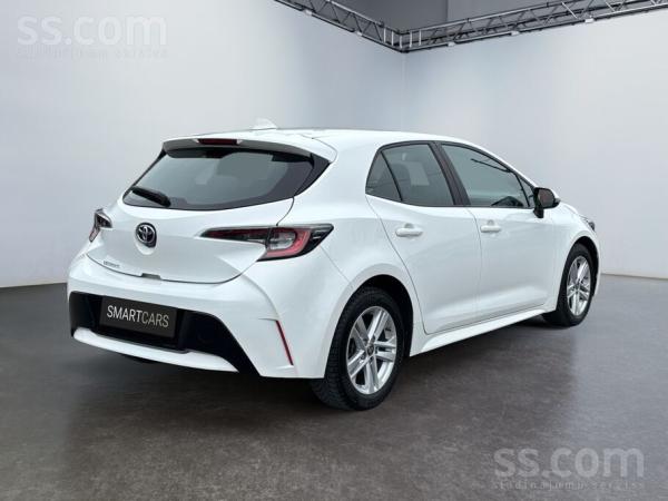White Toyota Corolla 2022 in Riga, with an engine capacity of 1.20 L and mileage of 147 thousand km for 11950 €, photo 5 on AUTOMOTO.COM.LV