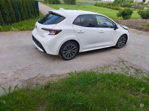 White Toyota Corolla 2022 in Kaunas, with an engine capacity of 1.80 L and mileage of 30 thousand km for 9399 €, photo 6 on AUTOMOTO.COM.LV