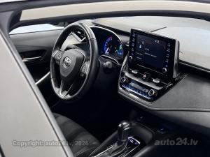 White Toyota Corolla 2023 in Tallinn, with an engine capacity of 1.80 L and mileage of 13 thousand km for 20990 €, photo 13 on AUTOMOTO.COM.LV
