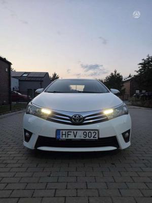 White Toyota Corolla 2014 in Vilnius, with an engine capacity of 1.60 L and mileage of 201 thousand km for 6900 €, photo  on AUTOMOTO.COM.LV