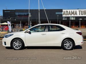Balts Toyota Corolla 2014 Tallina, ar dzinēja tilpumu 1.60 L un nobraukumu 124 tūkst. km par 8490 €, foto 3 vietnē AUTOMOTO.COM.LV