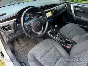 Balts Toyota Corolla 2014 Tallina, ar dzinēja tilpumu 1.60 L un nobraukumu 124 tūkst. km par 8490 €, foto 13 vietnē AUTOMOTO.COM.LV