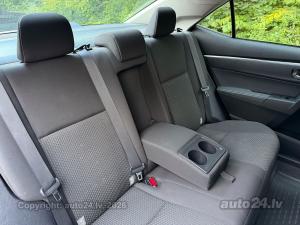 Balts Toyota Corolla 2014 Tallina, ar dzinēja tilpumu 1.60 L un nobraukumu 124 tūkst. km par 8490 €, foto 19 vietnē AUTOMOTO.COM.LV