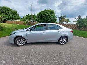 Balts Toyota Corolla 2015 Viļņa, ar dzinēja tilpumu 1.60 L un nobraukumu 215 tūkst. km par 7500 €, foto  vietnē AUTOMOTO.COM.LV