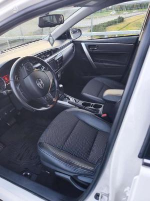 White Toyota Corolla 2016 in Vilnius, with an engine capacity of 1.60 L and mileage of 178 thousand km for 10490 €, photo 8 on AUTOMOTO.COM.LV