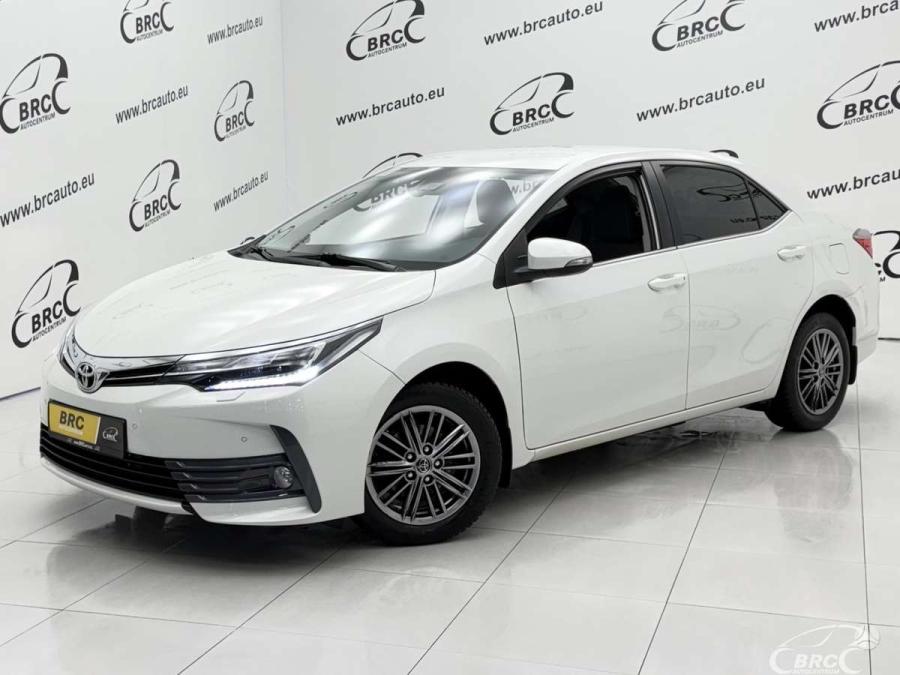 White Toyota Corolla 2018 in Vilnius, with an engine capacity of 1.60 L and mileage of 108 thousand km for 9900 €, photo 1 on AUTOMOTO.COM.LV