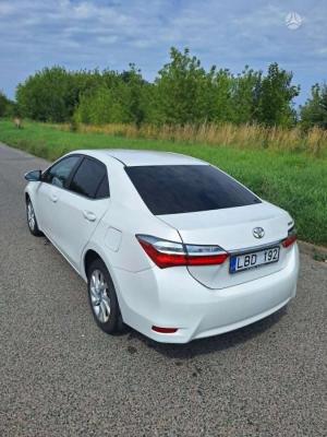 Белый Тойота Королла 2018 в Вильнюс, объемом двигателя 1.60 л и пробегом 74 тыс. км за 9300 €, фото 9 на AUTOMOTO.COM.LV