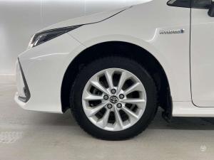 White Toyota Corolla 2020 in Vilnius, with an engine capacity of 1.80 L and mileage of 125 thousand km for 16900 €, photo 15 on AUTOMOTO.COM.LV