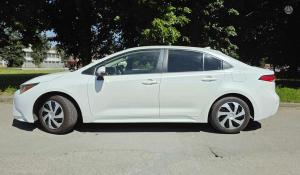White Toyota Corolla 2020 in Klaipeda, with an engine capacity of 1.80 L and mileage of 100 thousand km for 15250 €, photo 4 on AUTOMOTO.COM.LV