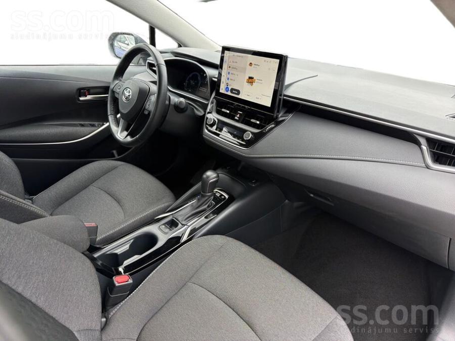 Balts Toyota Corolla 2024 Rīga, ar dzinēja tilpumu 1.80 L un nobraukumu 20 tūkst. km par 23590 €, foto 7 vietnē AUTOMOTO.COM.LV